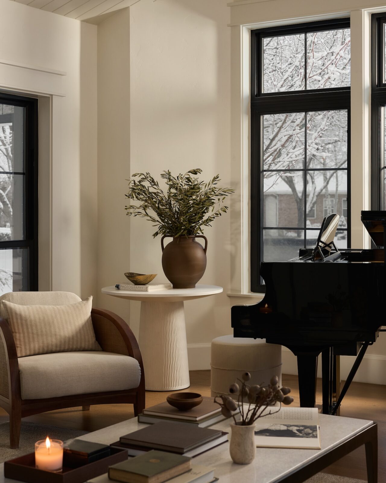 A Cozy Piano Room with Sophisticated Comfort Tailored for an Evolving ...